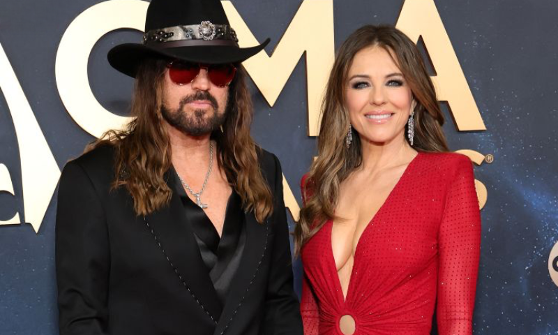 Elizabeth Hurley Stuns in Red as She Attends CMA Awards with Billy Ray ...